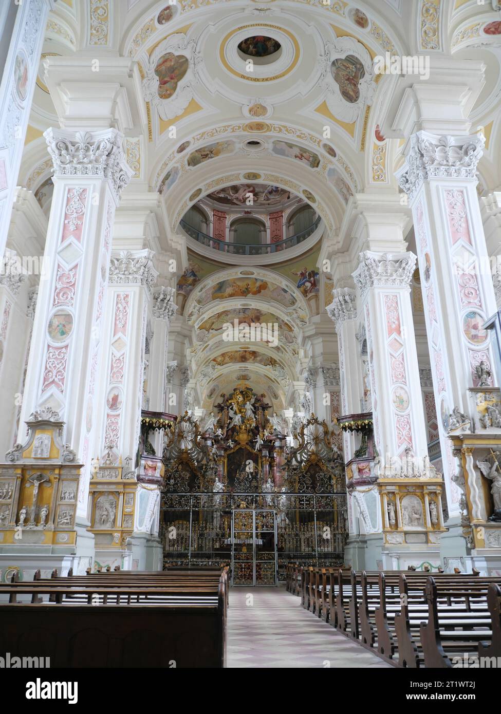 View of the chancel with red carpet and high altar with large picture ...