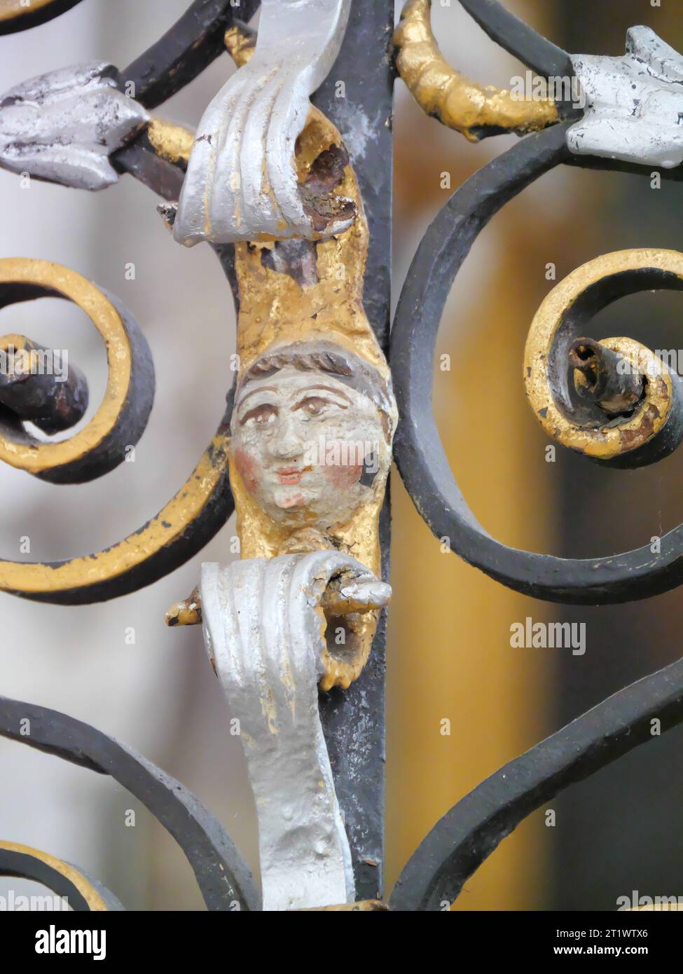 Miniature head in a baroque wrought iron grille in Schöntal monastery ...