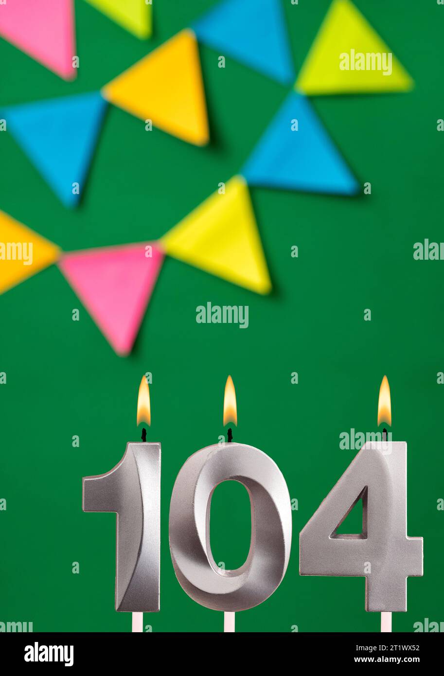 Vertical birthday card with number 104 candle - Green background with ...