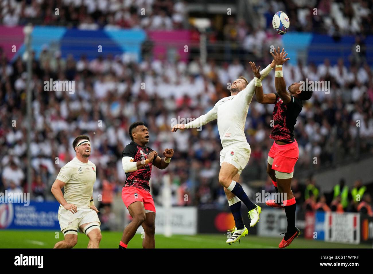 Fiji's Ilaisa Droasese, right, and England's Elliot Daly challenge for ...