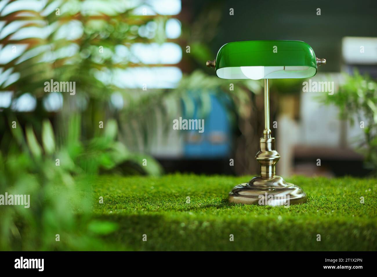 Sustainable business. grass desk in modern green office with lamp Stock ...