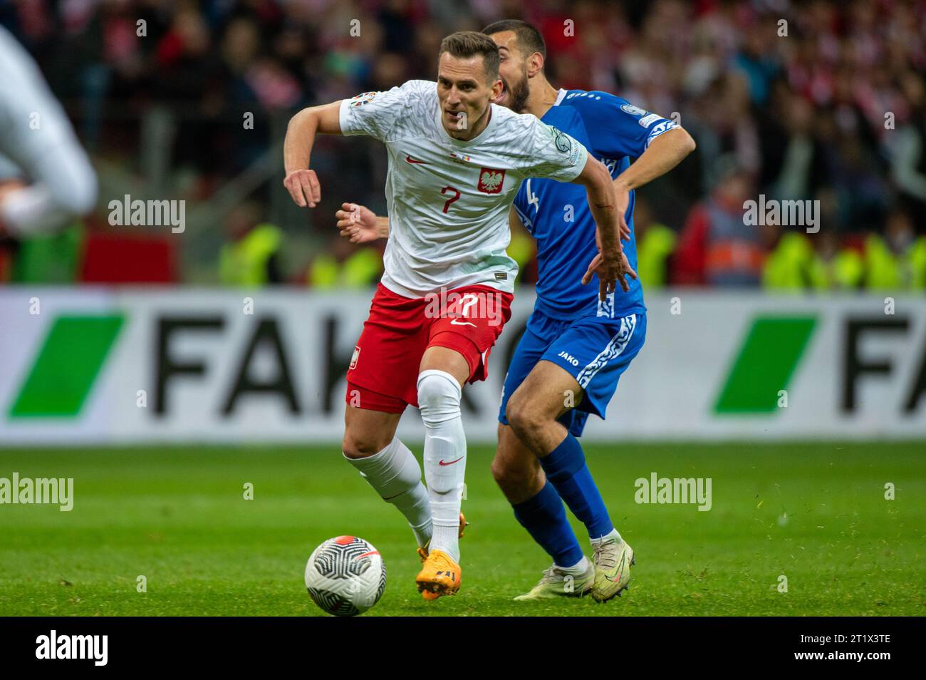 Warsaw, Poland. 15th Oct, 2023. Arkadiusz Milik of Poland and Vladislav ...