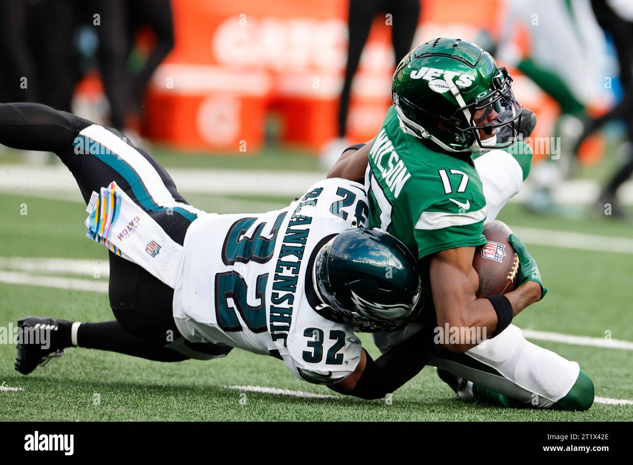Philadelphia Eagles' Reed Blankenship, left, tackles New York Jets ...