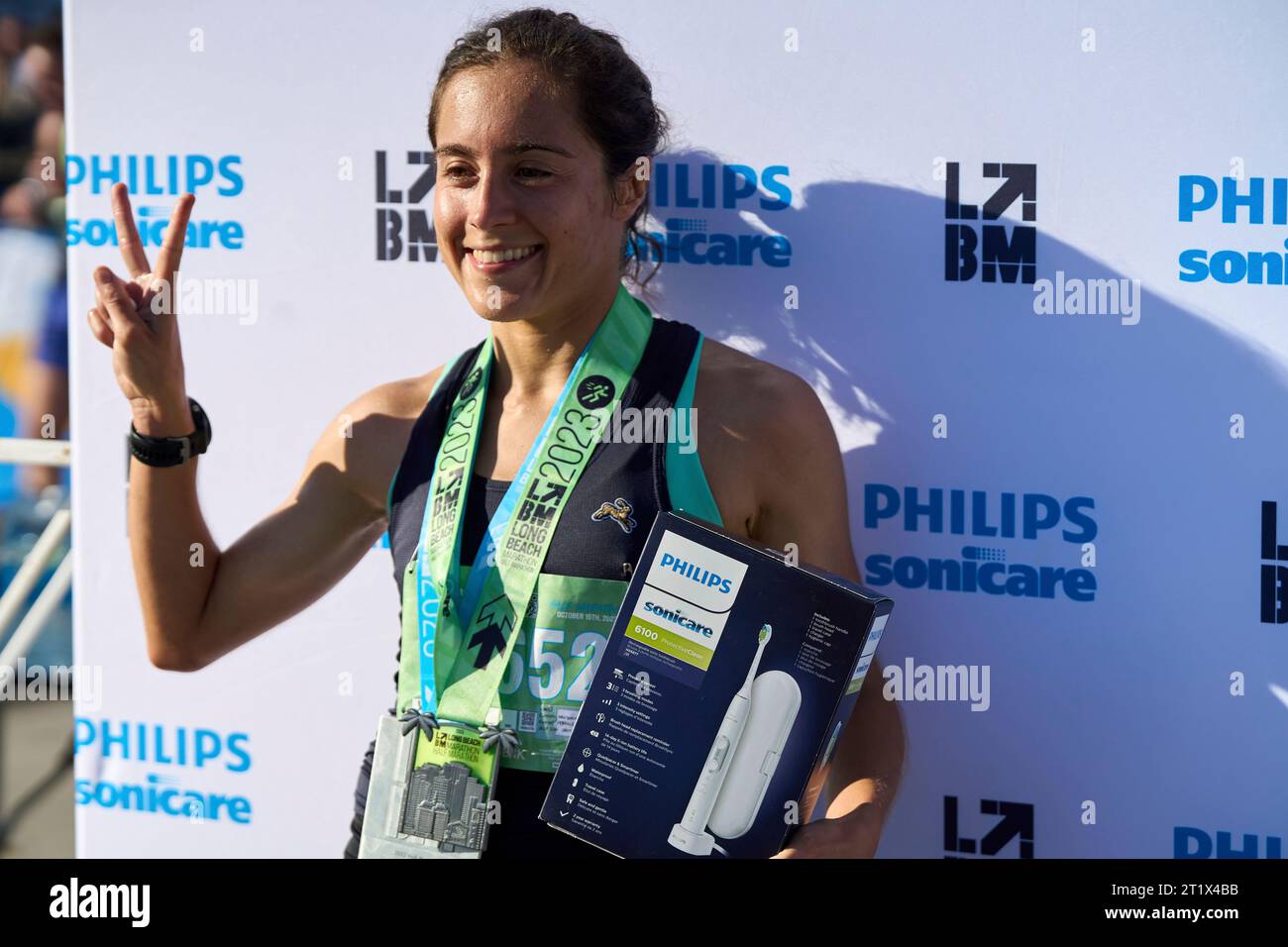 IMAGE DISTRIBUTED FOR PHILIPS SONICARE - Margoux Curcuru holds up a ...