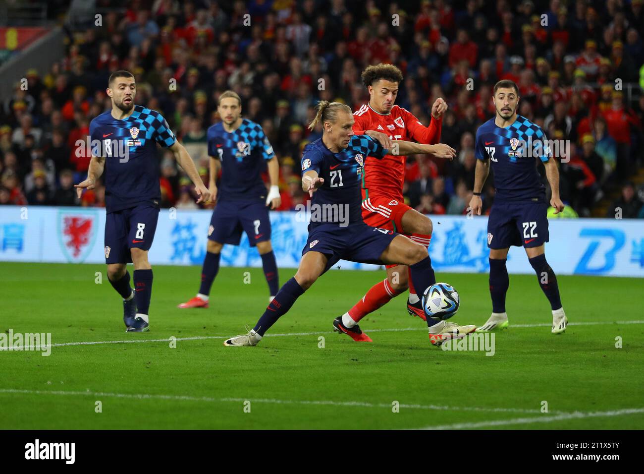 Cardiff, UK. 15th Oct, 2023. Ethan Ampadu of Wales (c) and Domagoj Vida ...