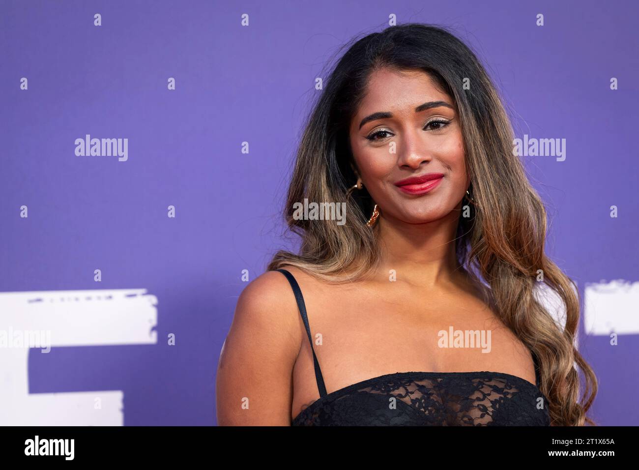 Dinusha Ilanperuma poses for photographers at the premiere of the film 'The Kitchen' during the ...