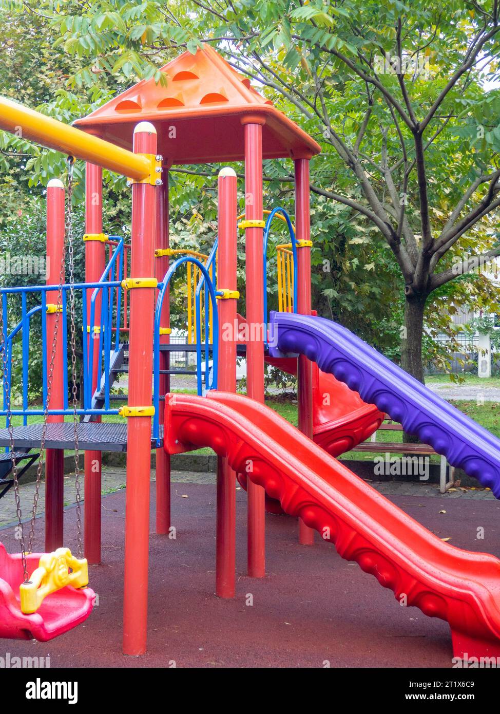 Plastic playground. Safe game for children. City infrastructure. Swings ...