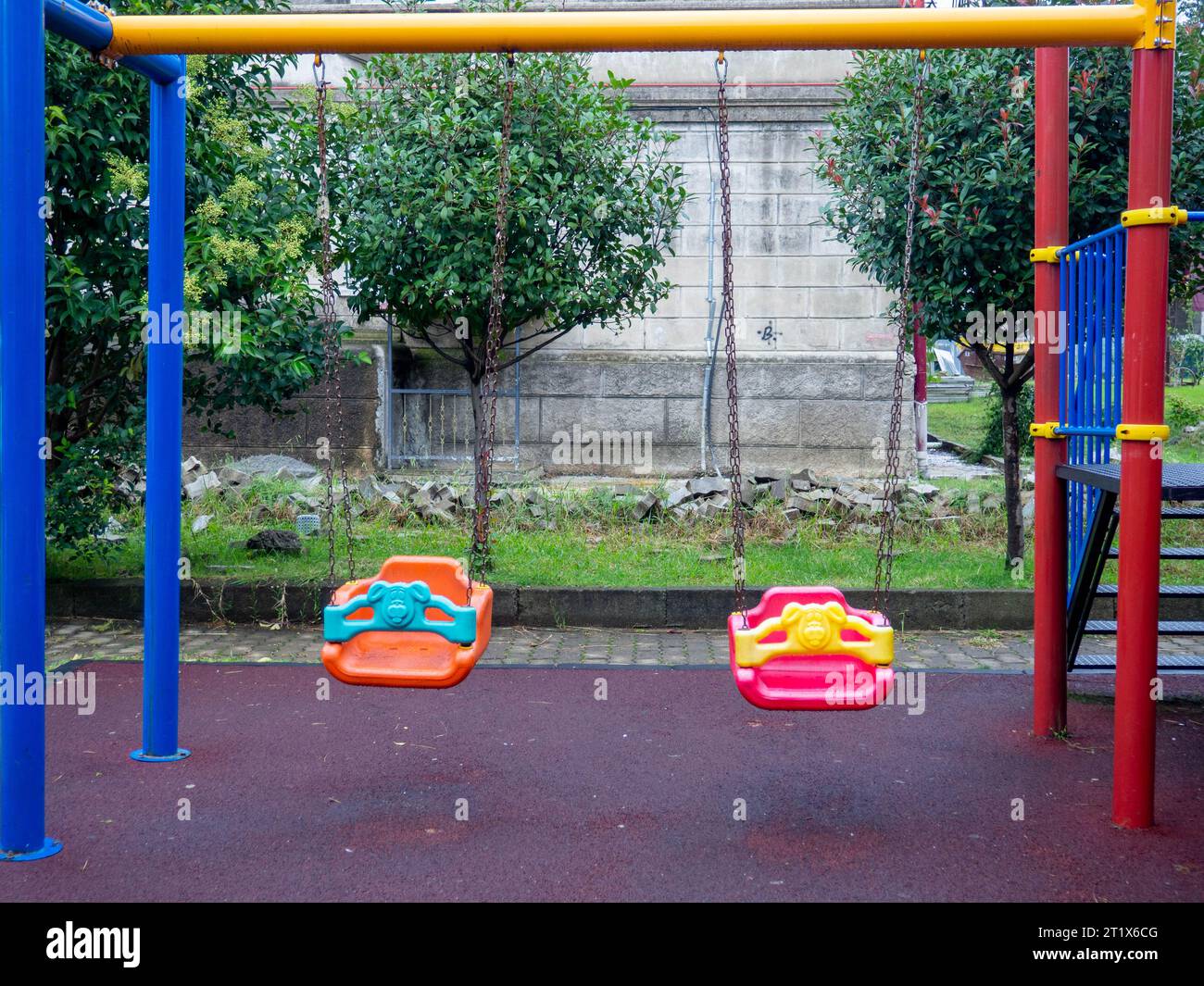 Plastic playground. Safe game for children. City infrastructure. Swings ...