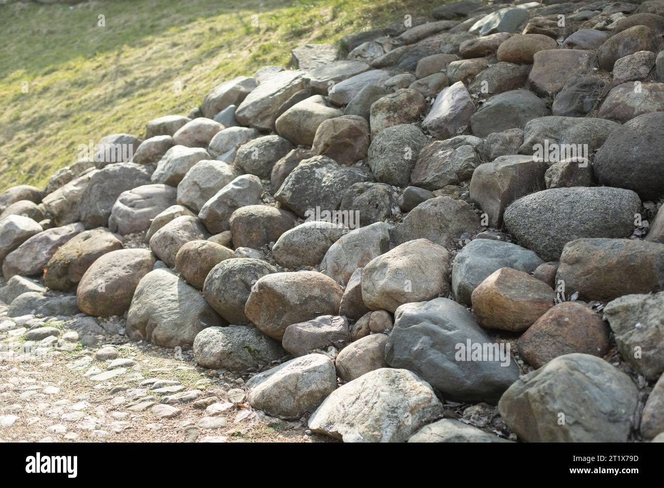 Stones in park. Cobblestone masonry. Details of park. Landscape design ...