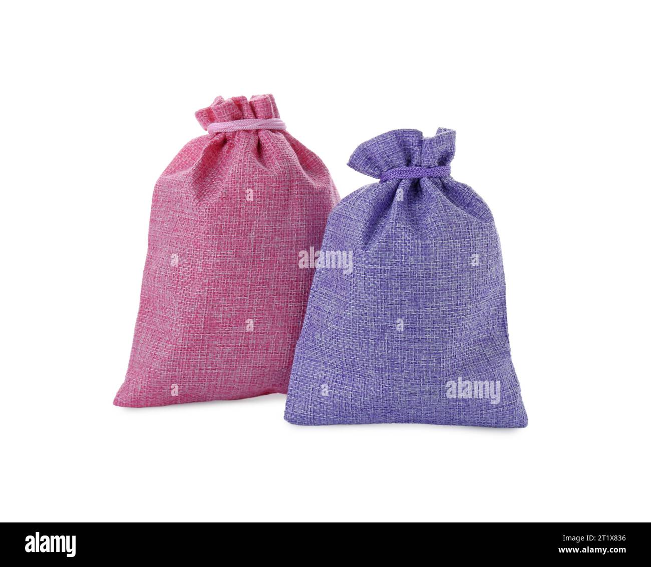 Two tied burlap bags isolated on white Stock Photo - Alamy
