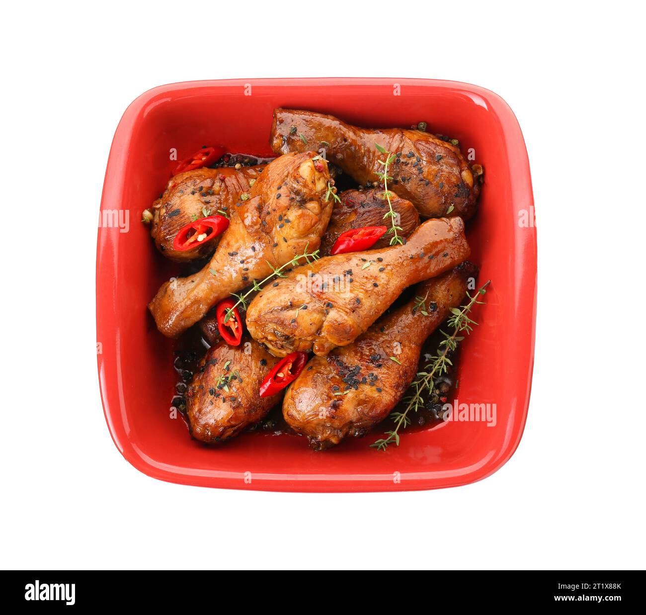 Chicken legs glazed with soy sauce, black sesame, chili and thyme ...