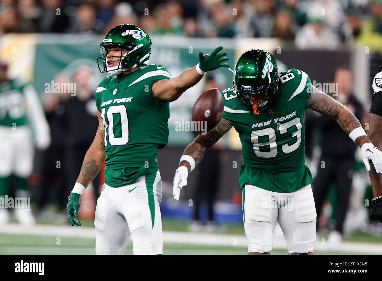 New York Jets' Allen Lazard, left, reacts during the second half of an ...