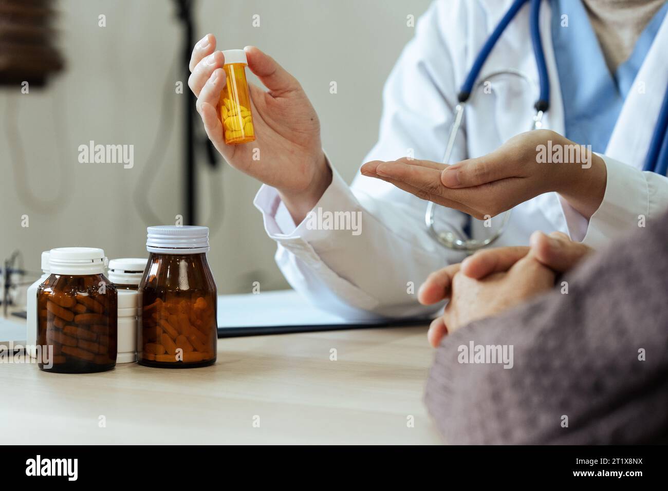 Old man is taking medication according to schedule set by doctor Stock ...