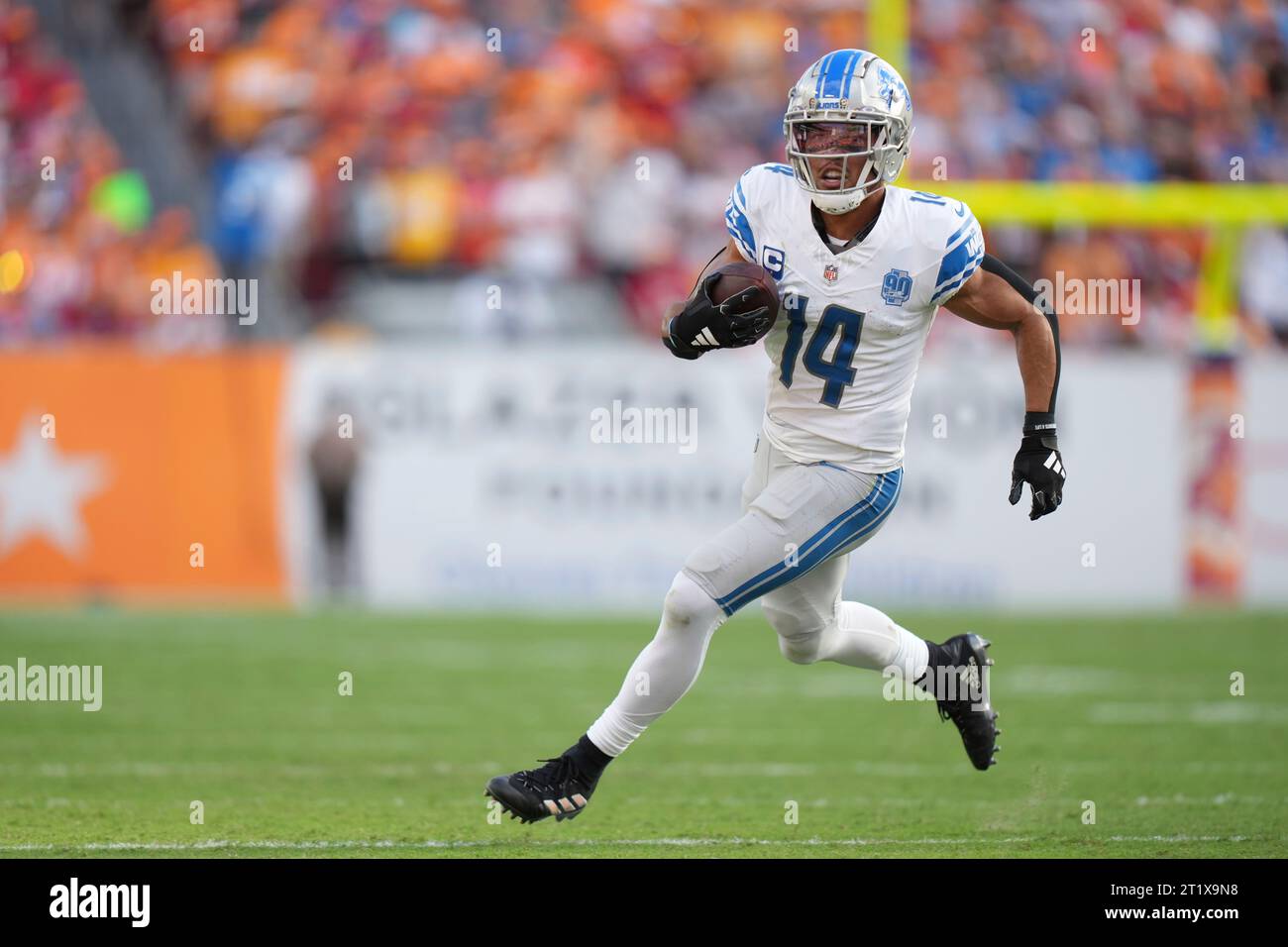 Detroit Lions wide receiver Amon-Ra St. Brown (14) runs for a touchdown ...