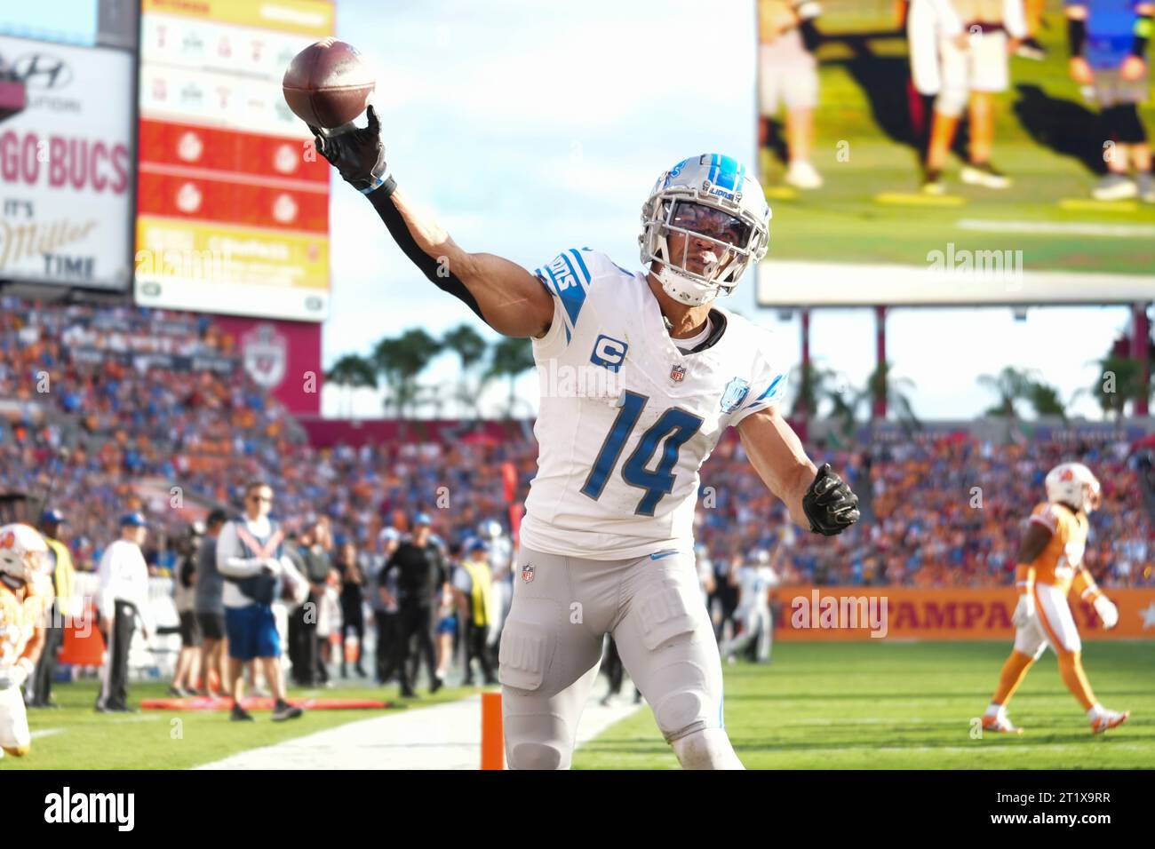 Detroit Lions wide receiver Amon-Ra St. Brown (14) throws the ball hard ...