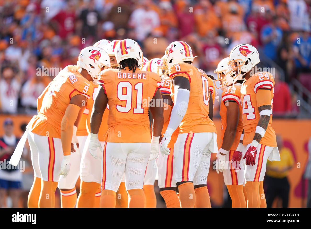 The Tampa Bay Buccaneers defensive line huddles during an NFL football ...