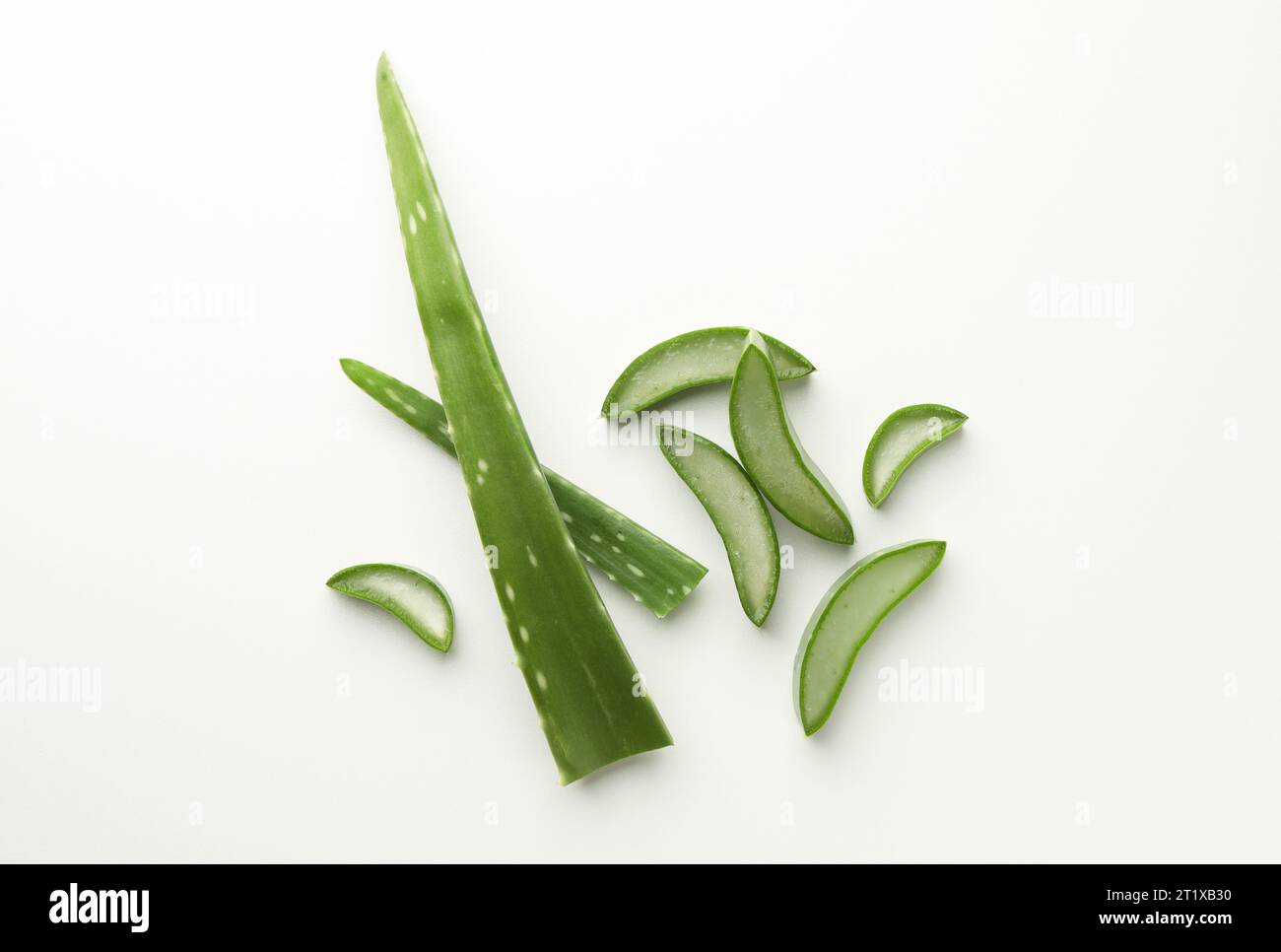 Cut aloe vera on white background, flat lay Stock Photo - Alamy