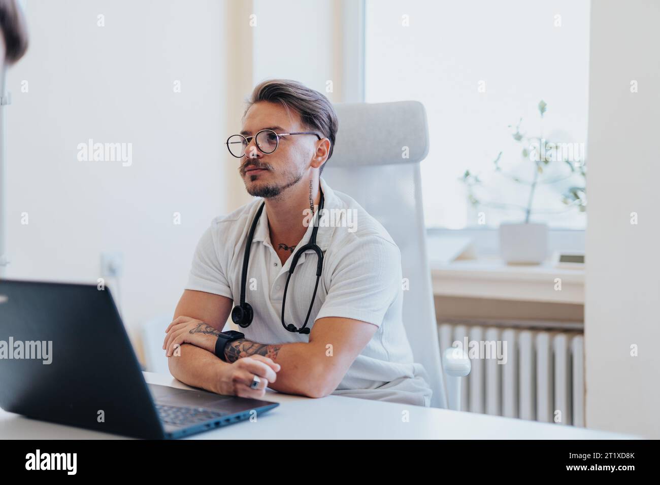 Doctor reviewing health test results hi-res stock photography and ...