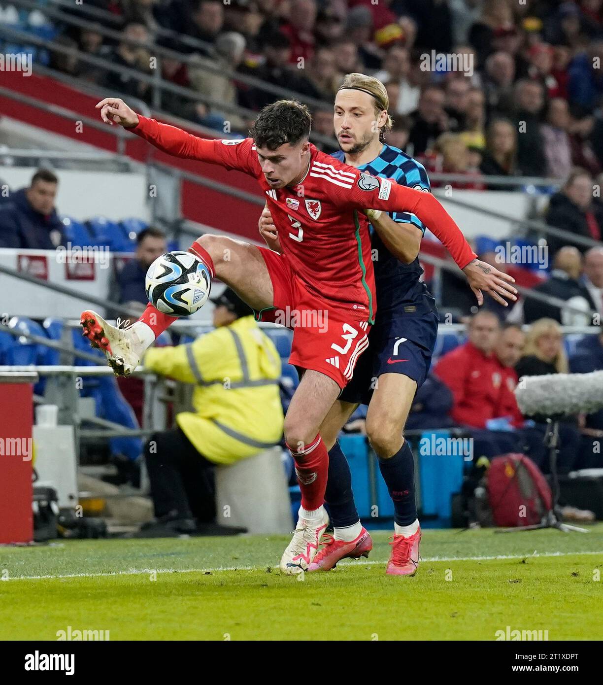 Cardiff,UK, 15 Oct 2023 Neco Williams (Wales) #3 under pressure from ...