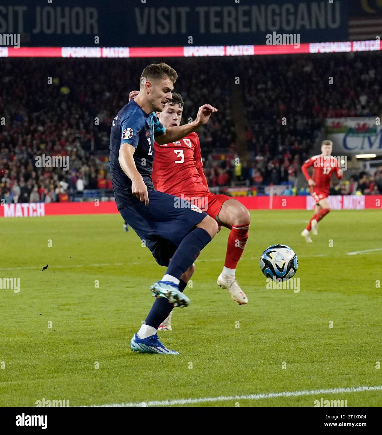 Cardiff,UK, 15 Oct 2023 Josip Stanisic (Croatia) (L) in action during ...