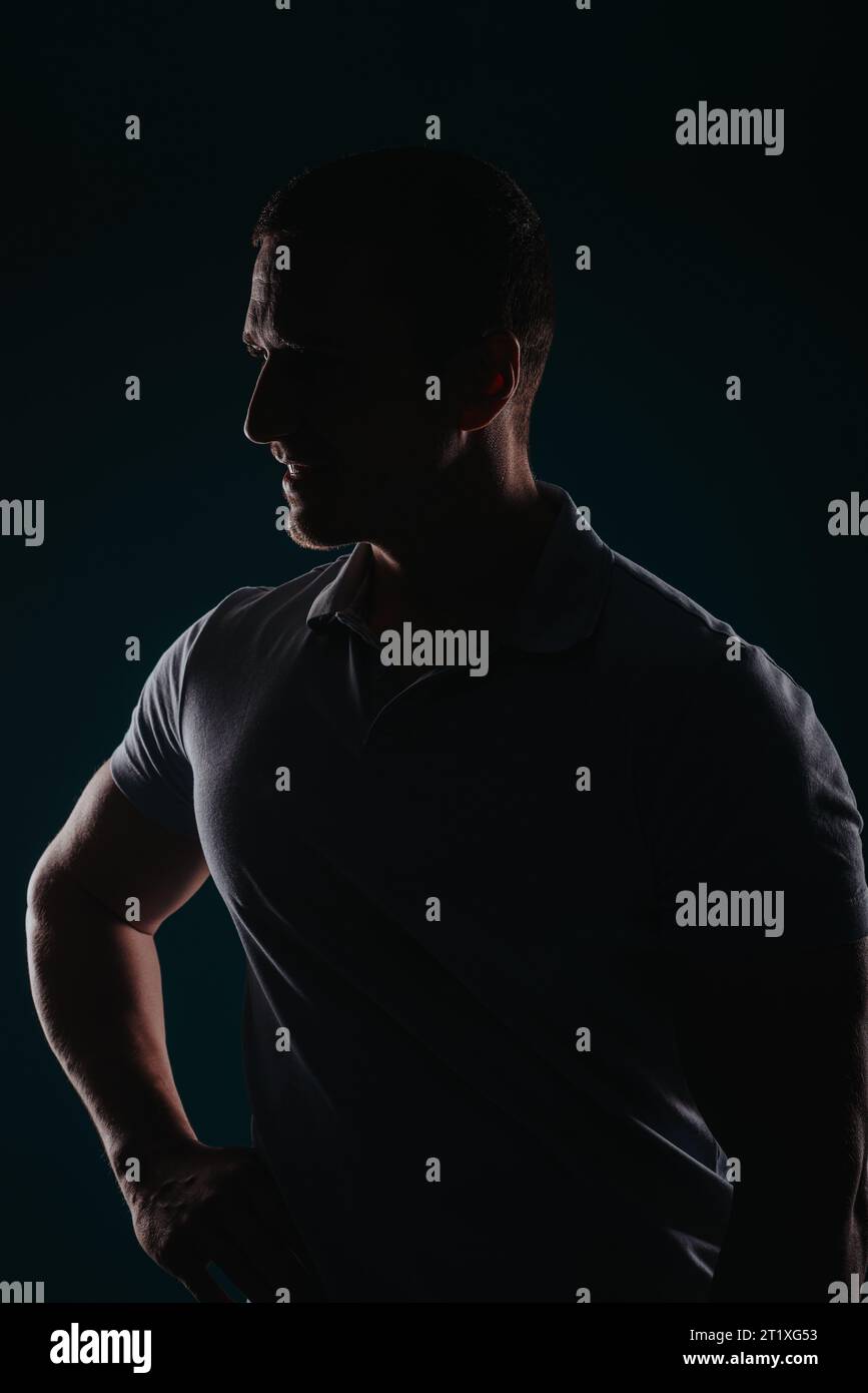 Handsome and muscular man posing Stock Photo - Alamy