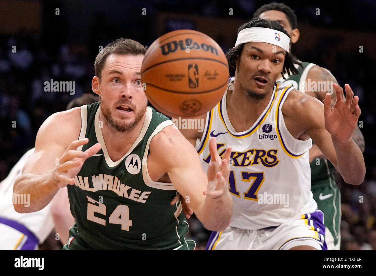 Milwaukee Bucks guard Pat Connaughton, left, and Los Angeles Lakers ...