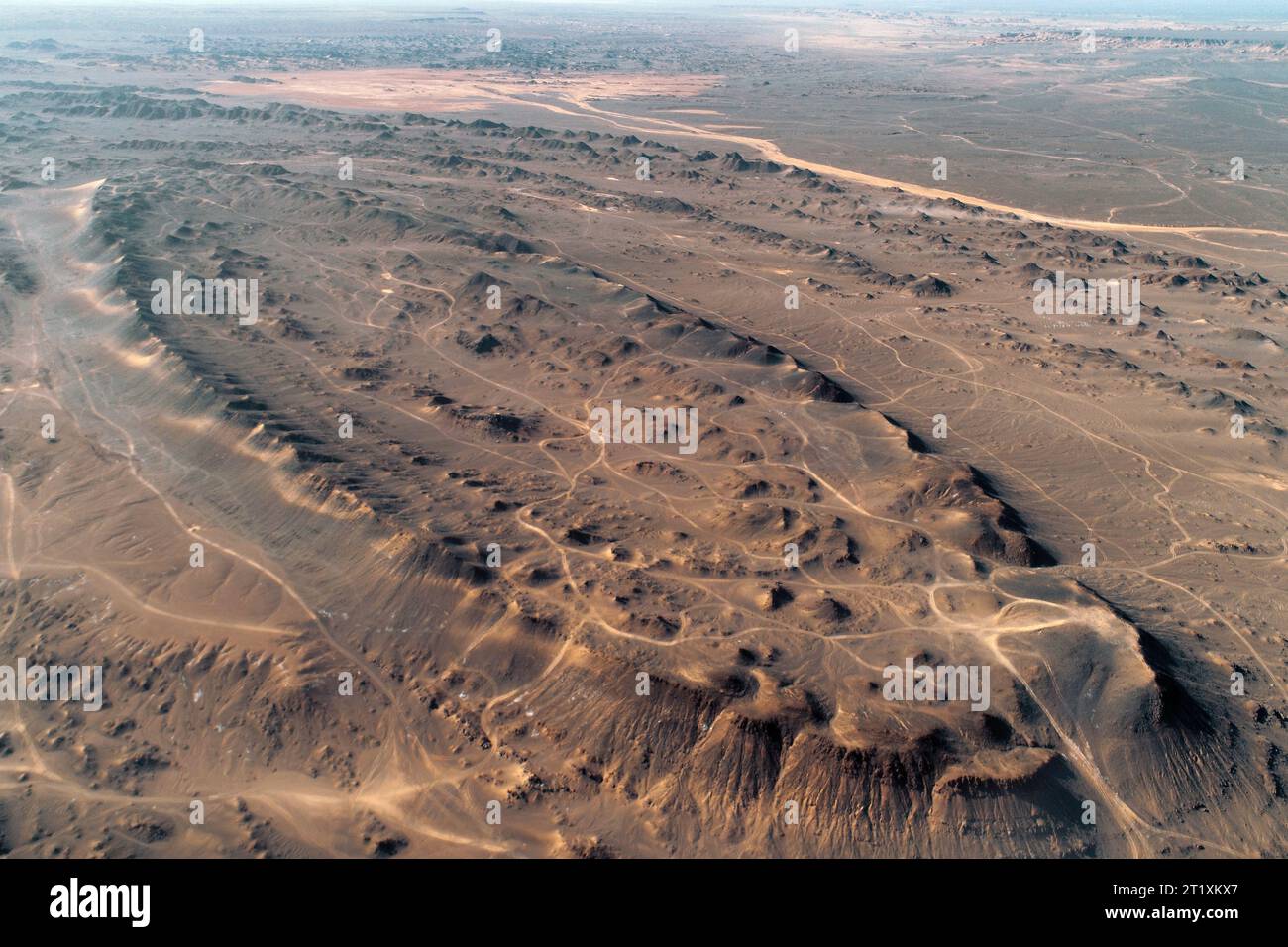 HAMI, CHINA - OCTOBER 15, 2023 - An elliptical crater basin is seen in ...