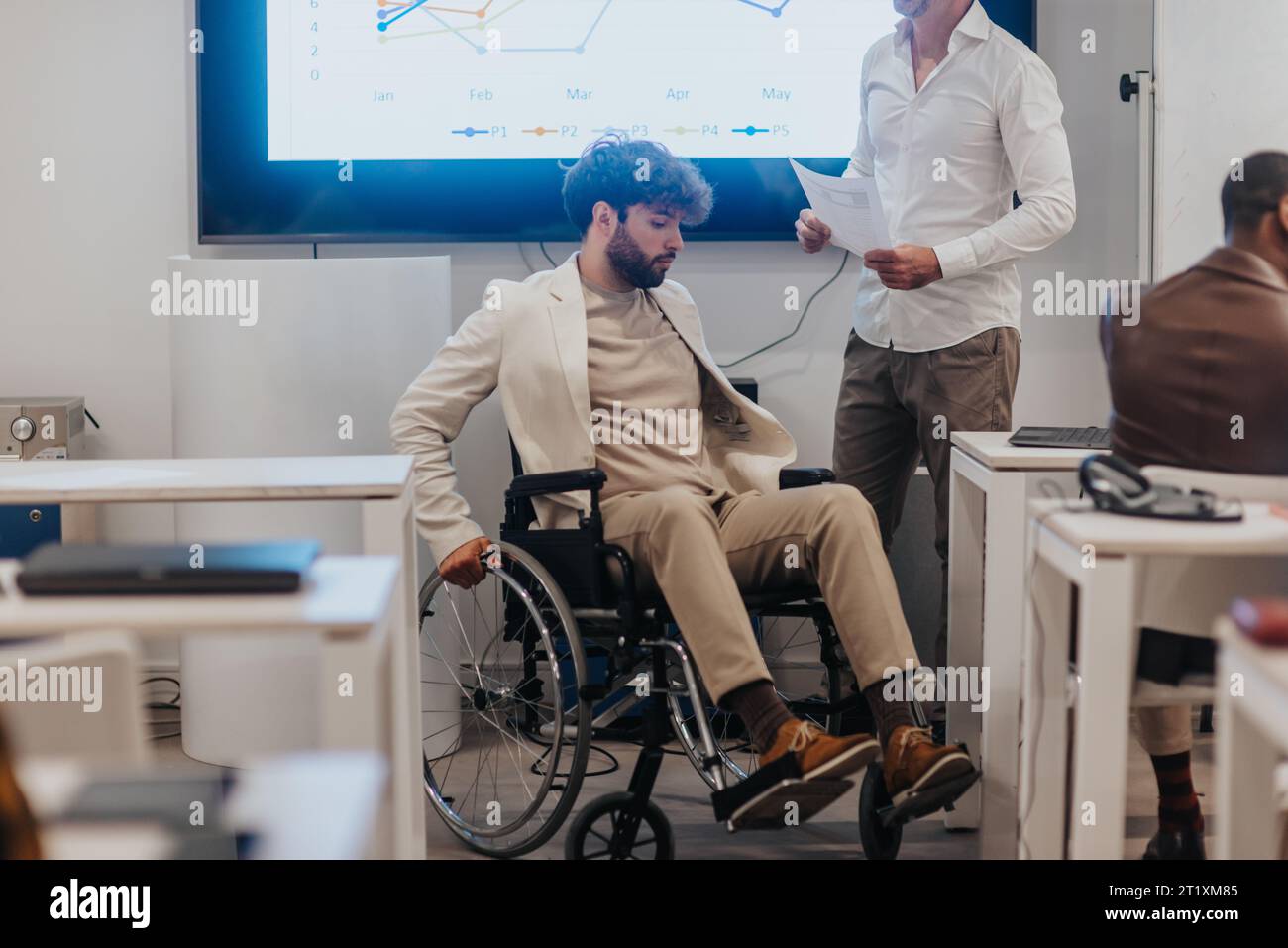 Disabled man in wheelchair. Handicapped male employee. Disabled man ...