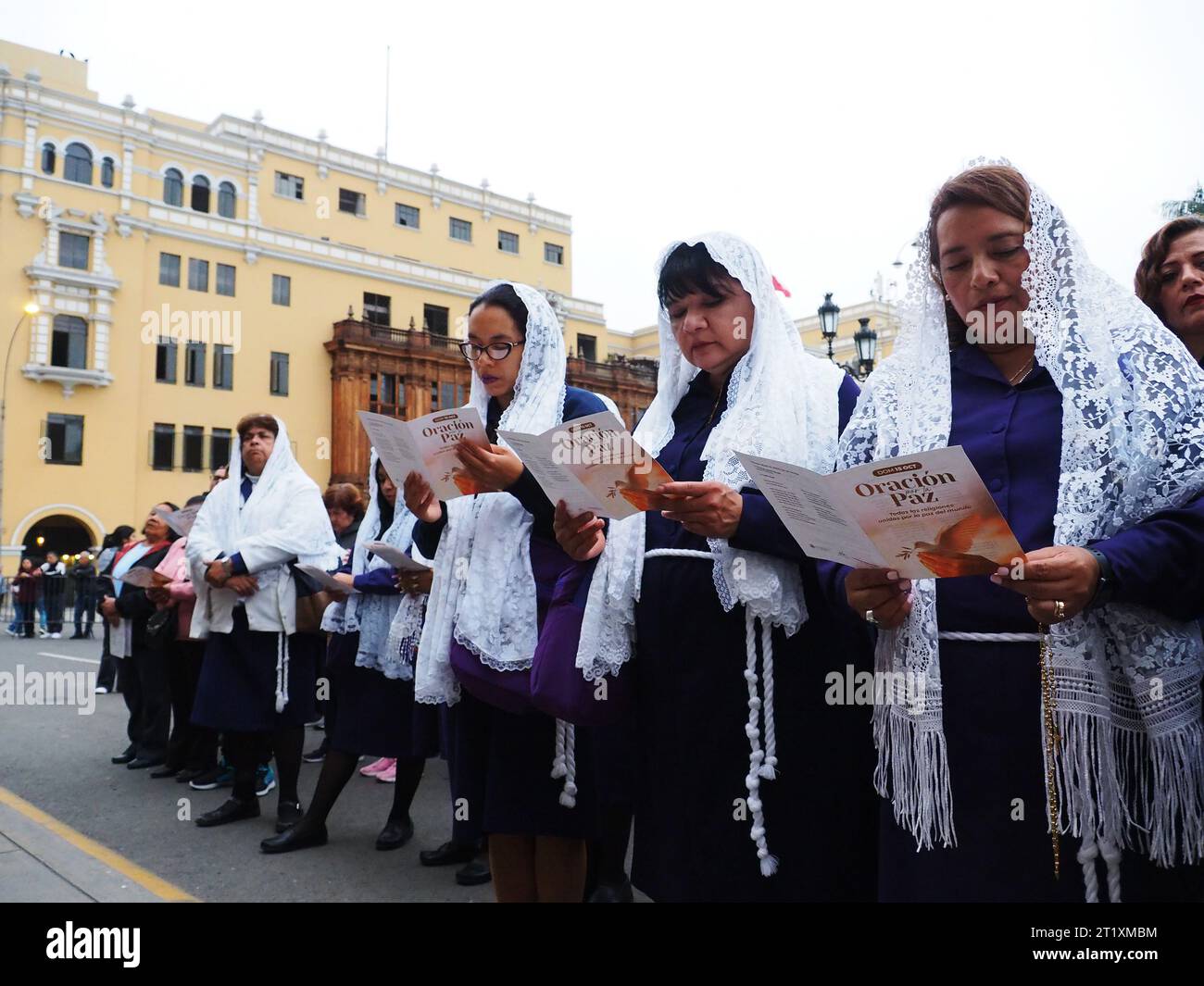 Lima, Peru. 15th Oct, 2023. Devotees praying when leaders of different ...
