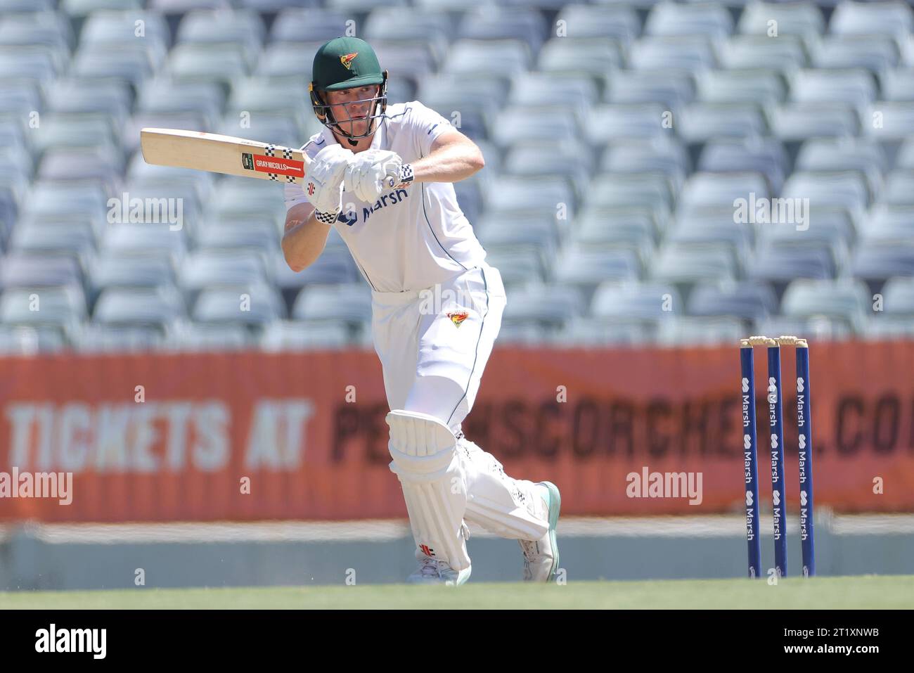 Perth, Australia. 16th Oct, 2023. Mitch Owen of Tasmania bats during ...