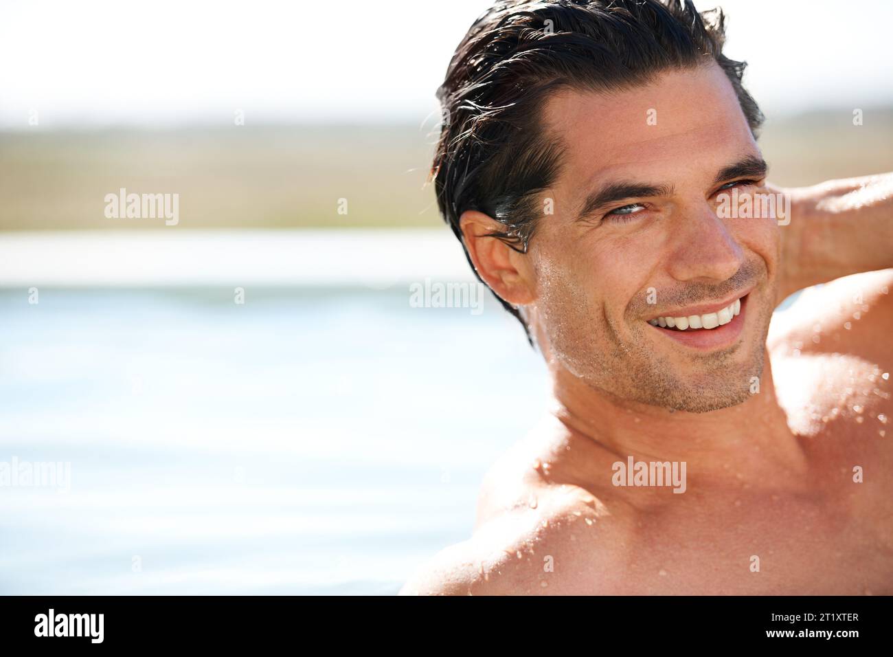 Pool, rooftop and portrait of man swimming outdoor for travel, freedom ...