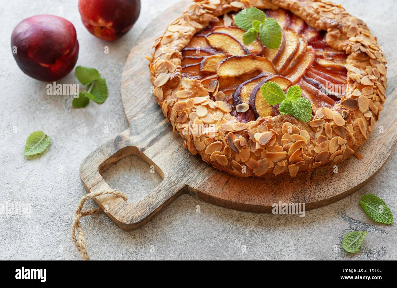 Homemade galette with peaches. Homemade open pie with fresh fruits ...
