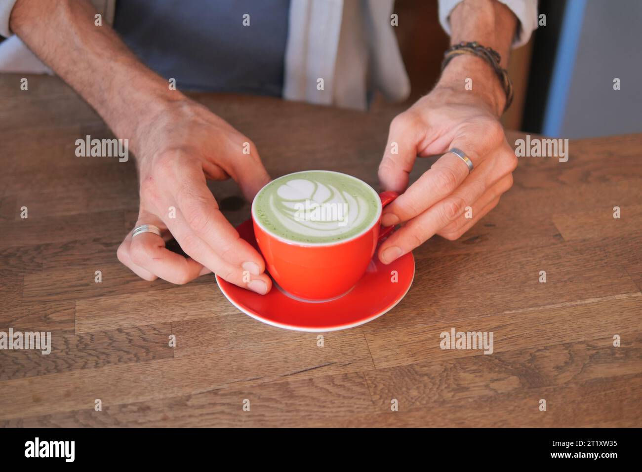 Offering cup hi-res stock photography and images - Alamy