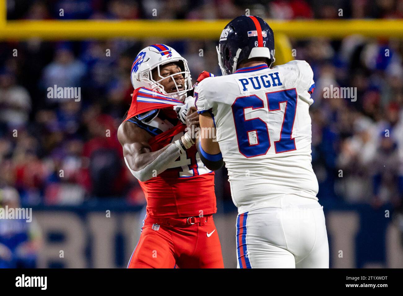 Buffalo Bills linebacker Dorian Williams (42) and New York Giants guard ...