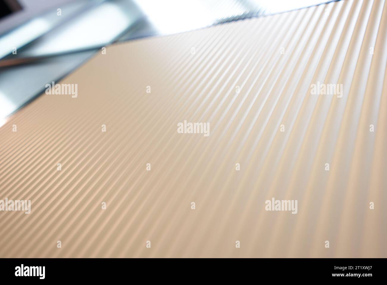 Beige kitchen cabinets with wavy texture. Glass inserts. Push mechanism ...