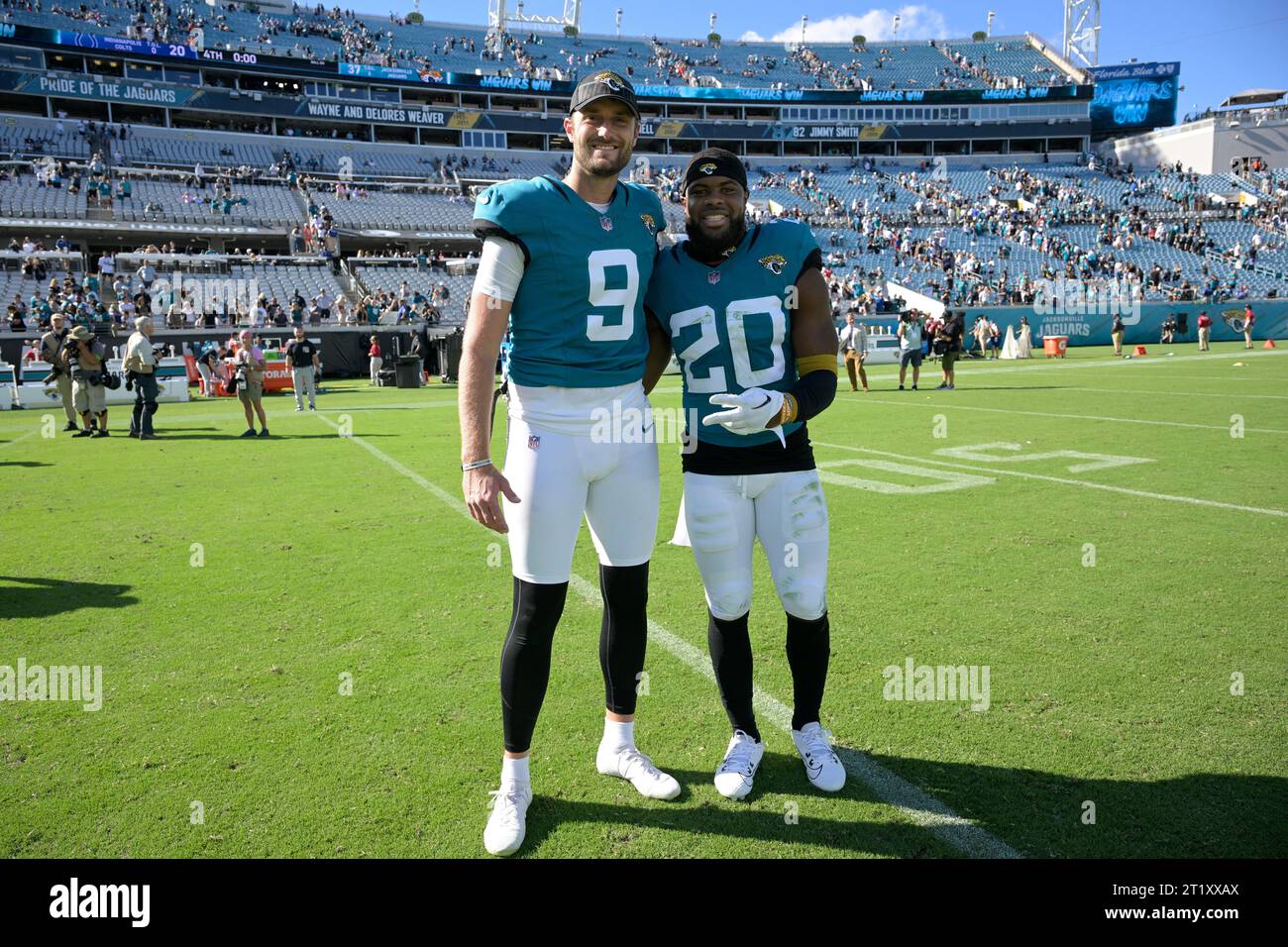 Jacksonville Jaguars punter Logan Cooke (9) and safety Daniel Thomas ...