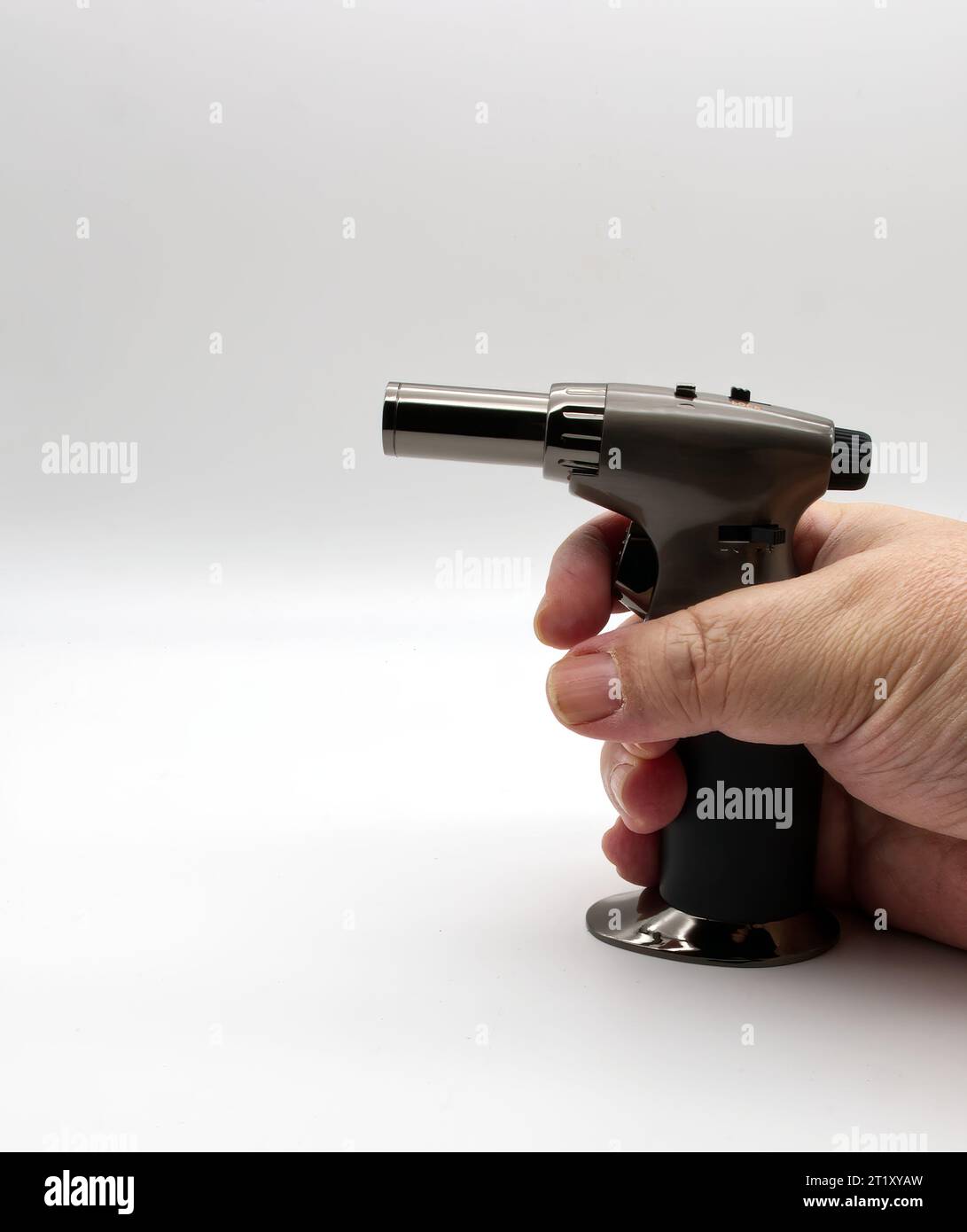 Flamethrower for kitchen isolated on white background Stock Photo - Alamy