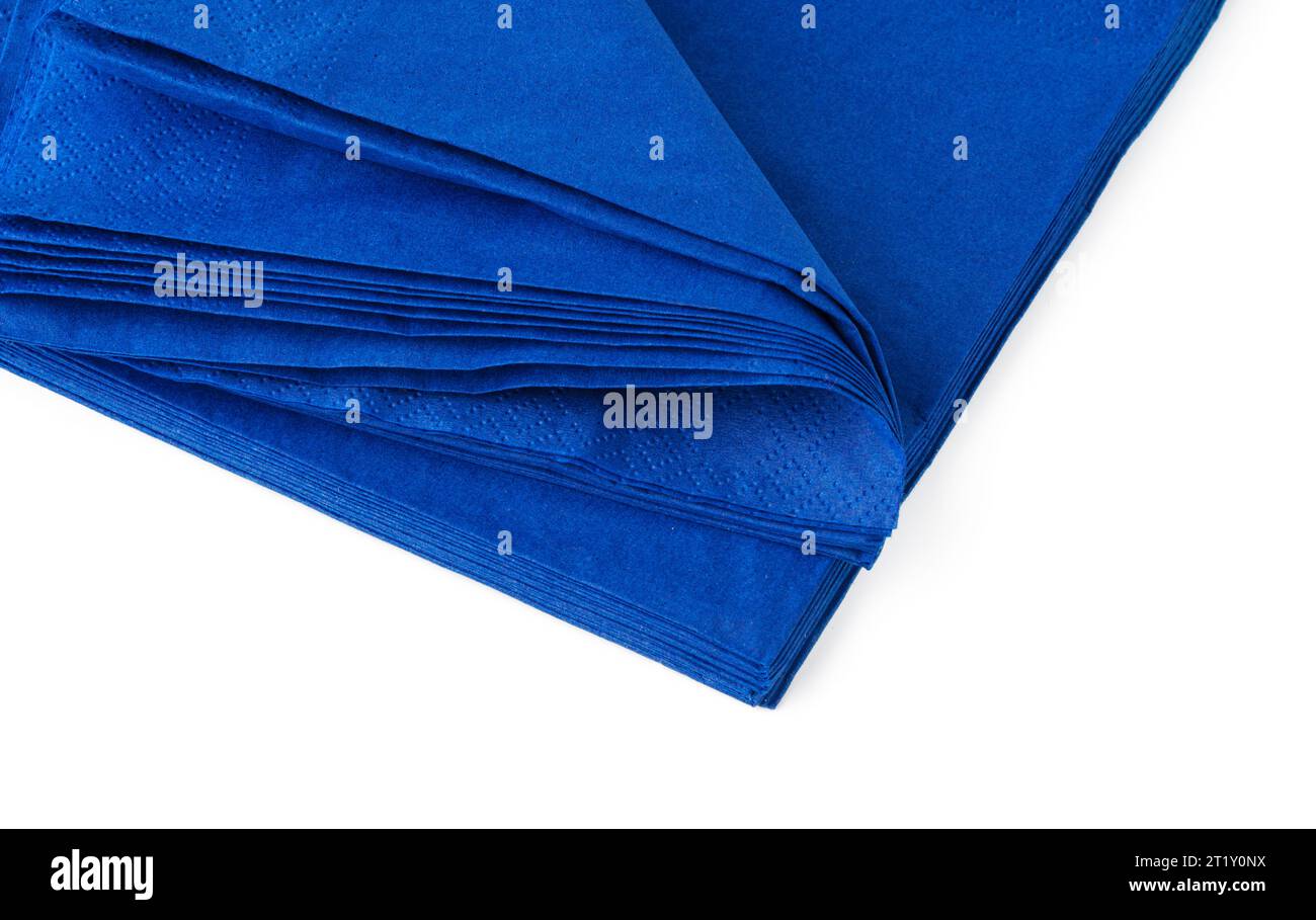 Stack of blue paper napkins on white background Stock Photo - Alamy