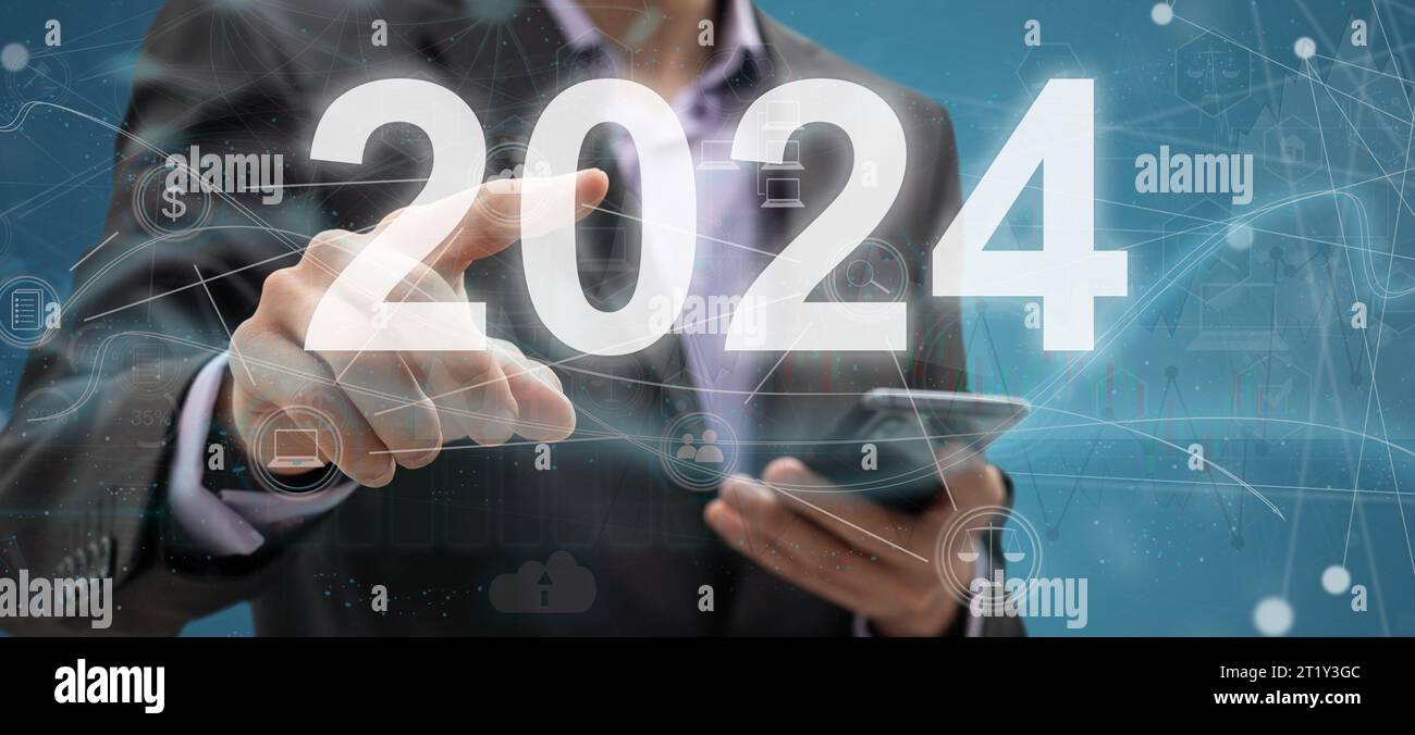 Trend 2024 with hologram businessman concept. new year 2024 Stock Photo - Alamy
