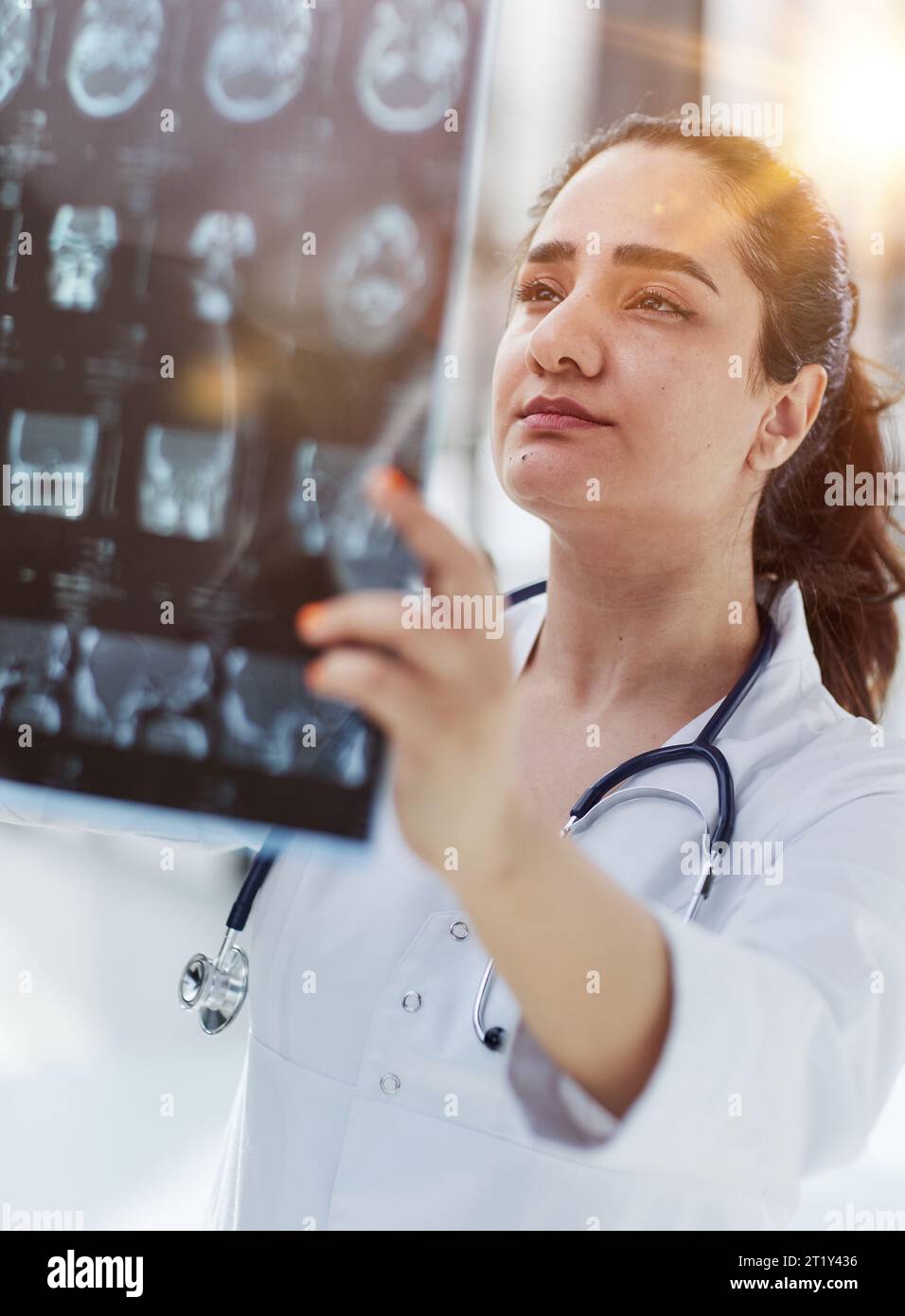 Brain disease diagnosis with medical doctor diagnosing elderly ageing ...