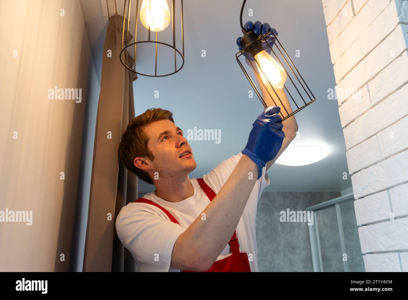 Electrician at work. Service for the repair of electrical wiring and ...