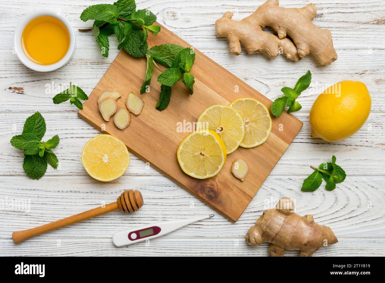 Natural cold and flu home remedies and thermometer. Natural ingredients ...