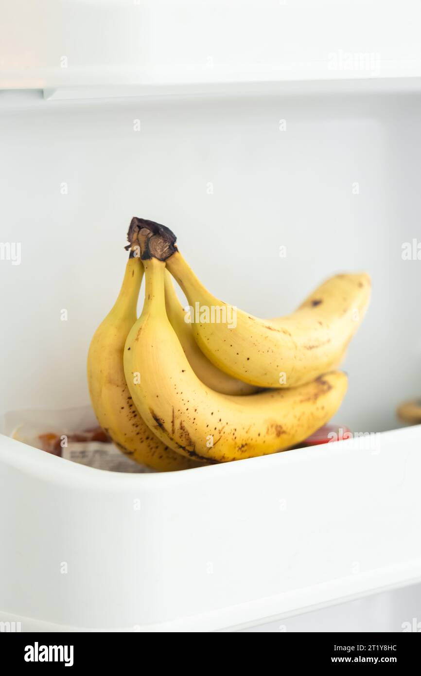 Close-up of bananas on the shelf in open fridge container Stock Photo ...