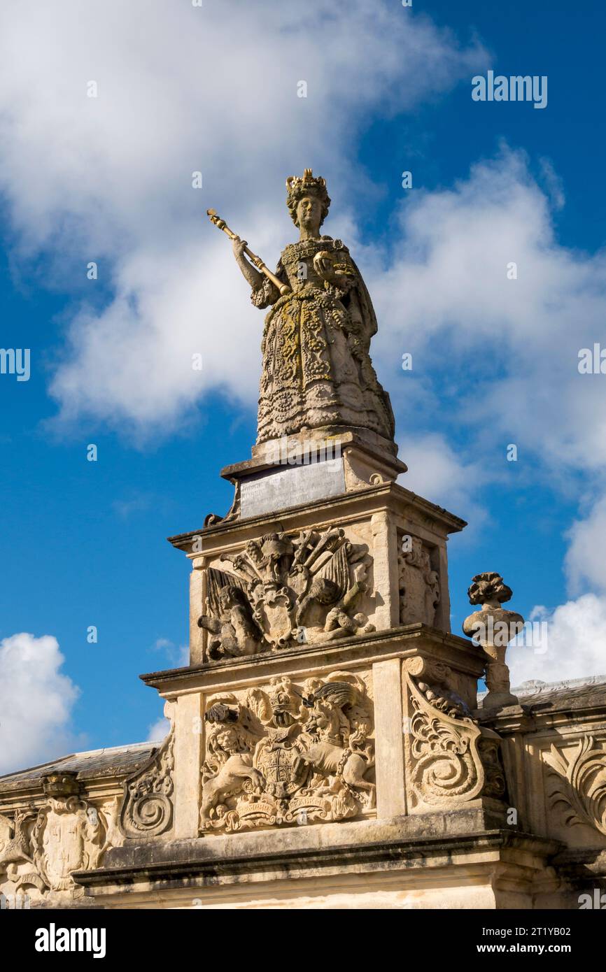 The 18c statue of Queen Anne (1665-1714) holding the royal orb and ...