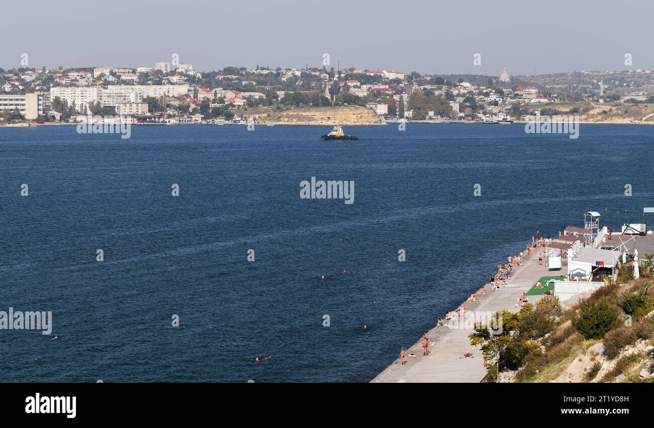People rest at the beach. Khrustalny aerial view, a cape off the ...