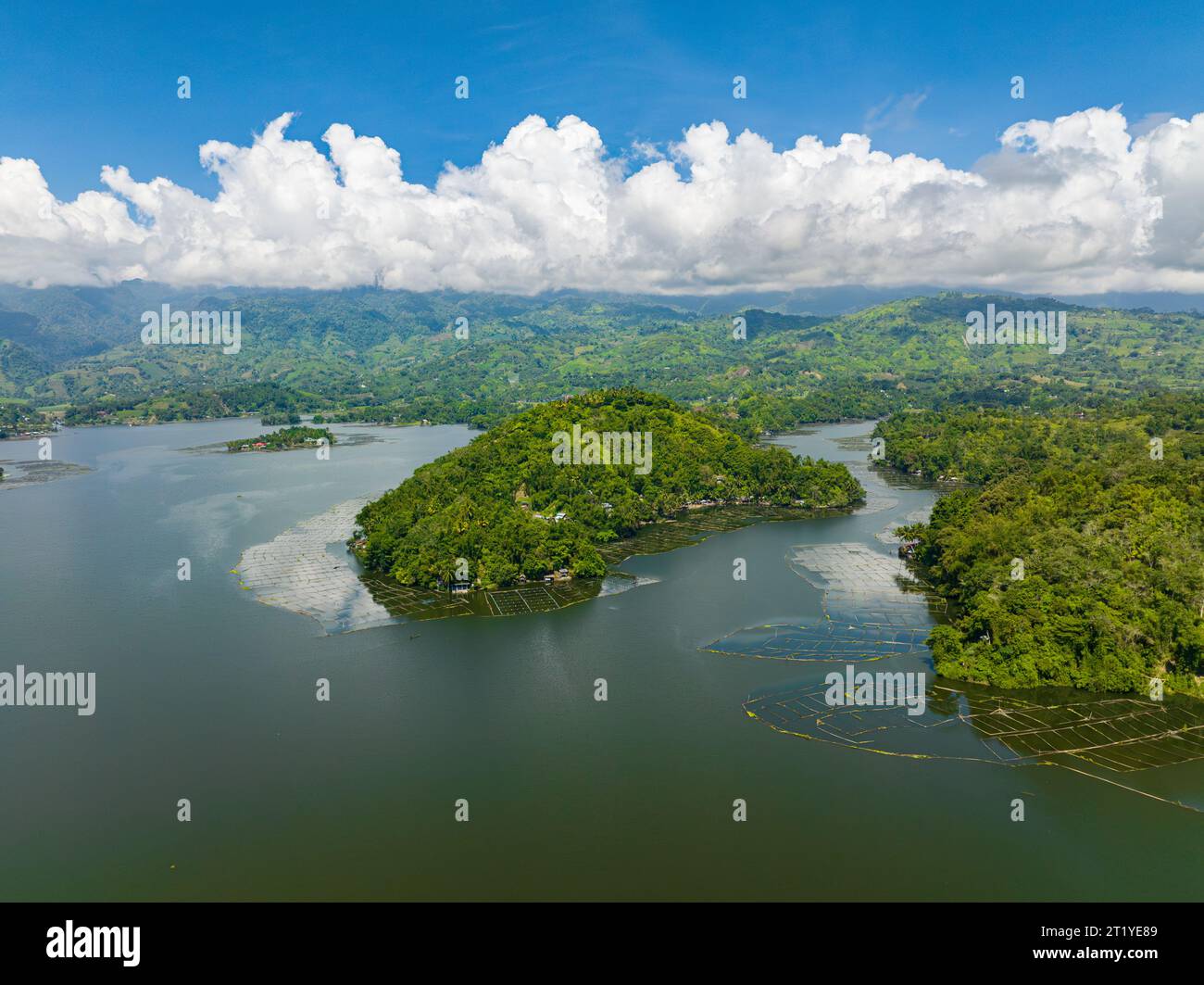 Lake Sebu and mountain with forest, jungle and trees. Blue sky and ...