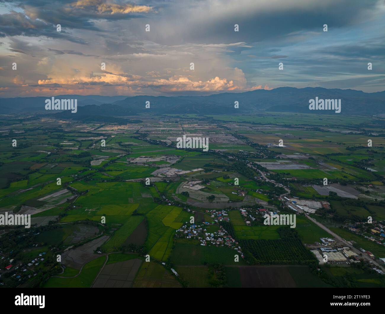 Agricultural landscape with paddy farms and farmers villages and house ...