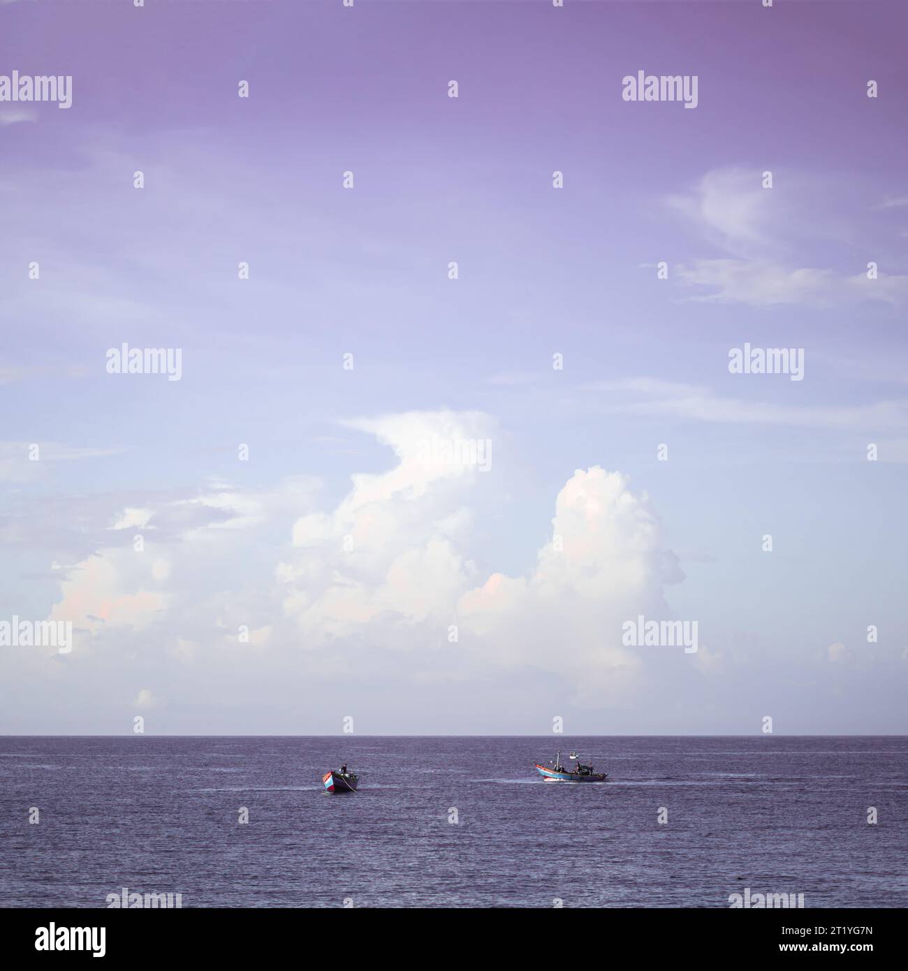 Sea sky cumulus cloud landscape view background. Calm water alone fishing boat. Destination aim ...