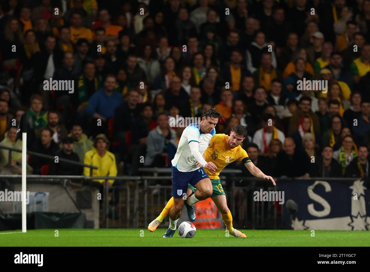 Jack Grealish of England and Ryan Strain of Australia - England v ...