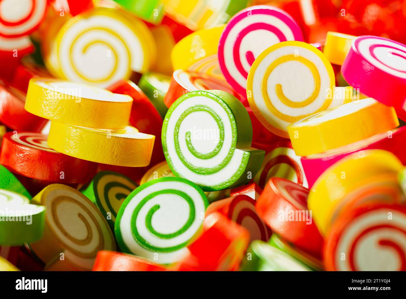 A delightful pile of round and swirly sweet treats made with vibrant ...